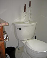 Apply faux oil rubbed bronze finish to chandelier or toilet handle